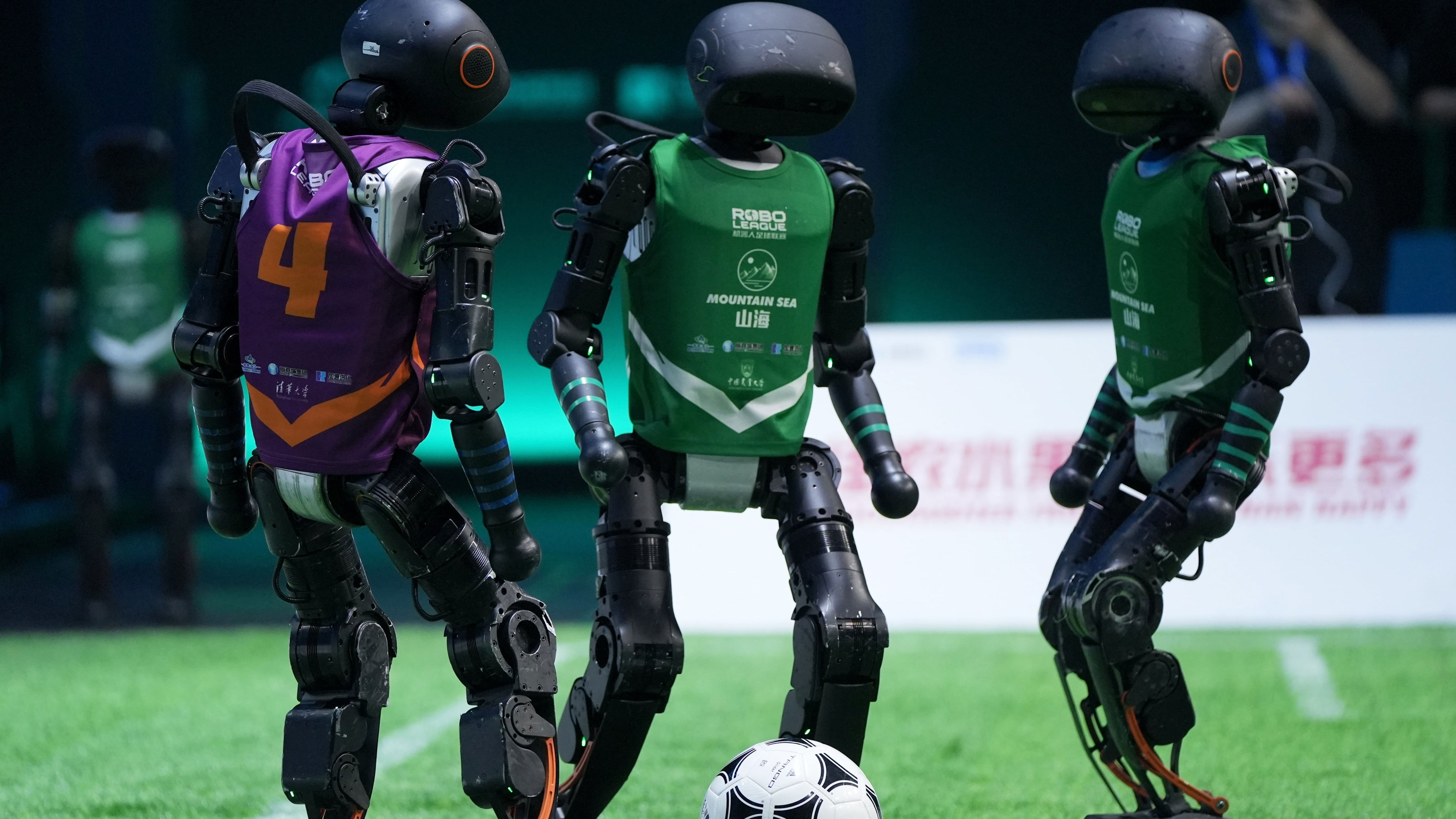 Humanoid Robots Face Off in Insane Soccer Tournament