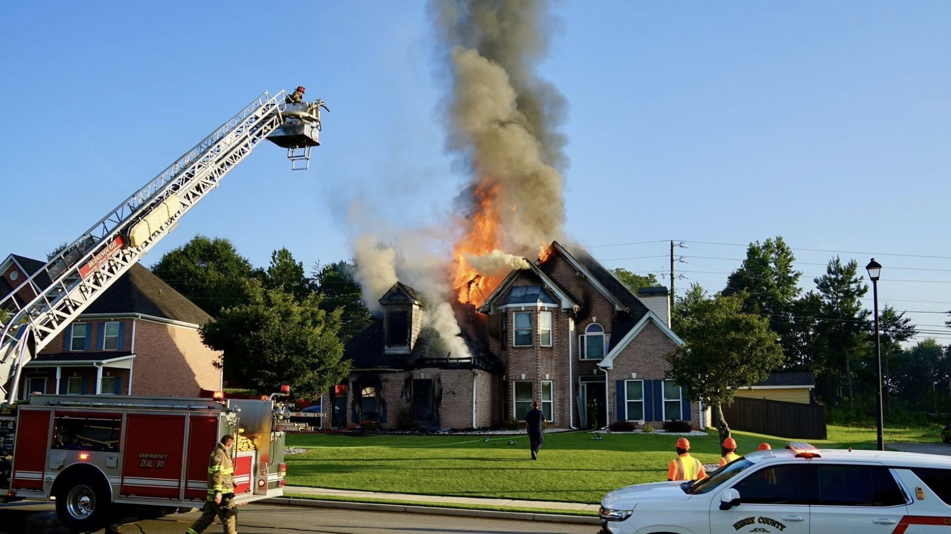 Crews respond to large house fire in Henry County