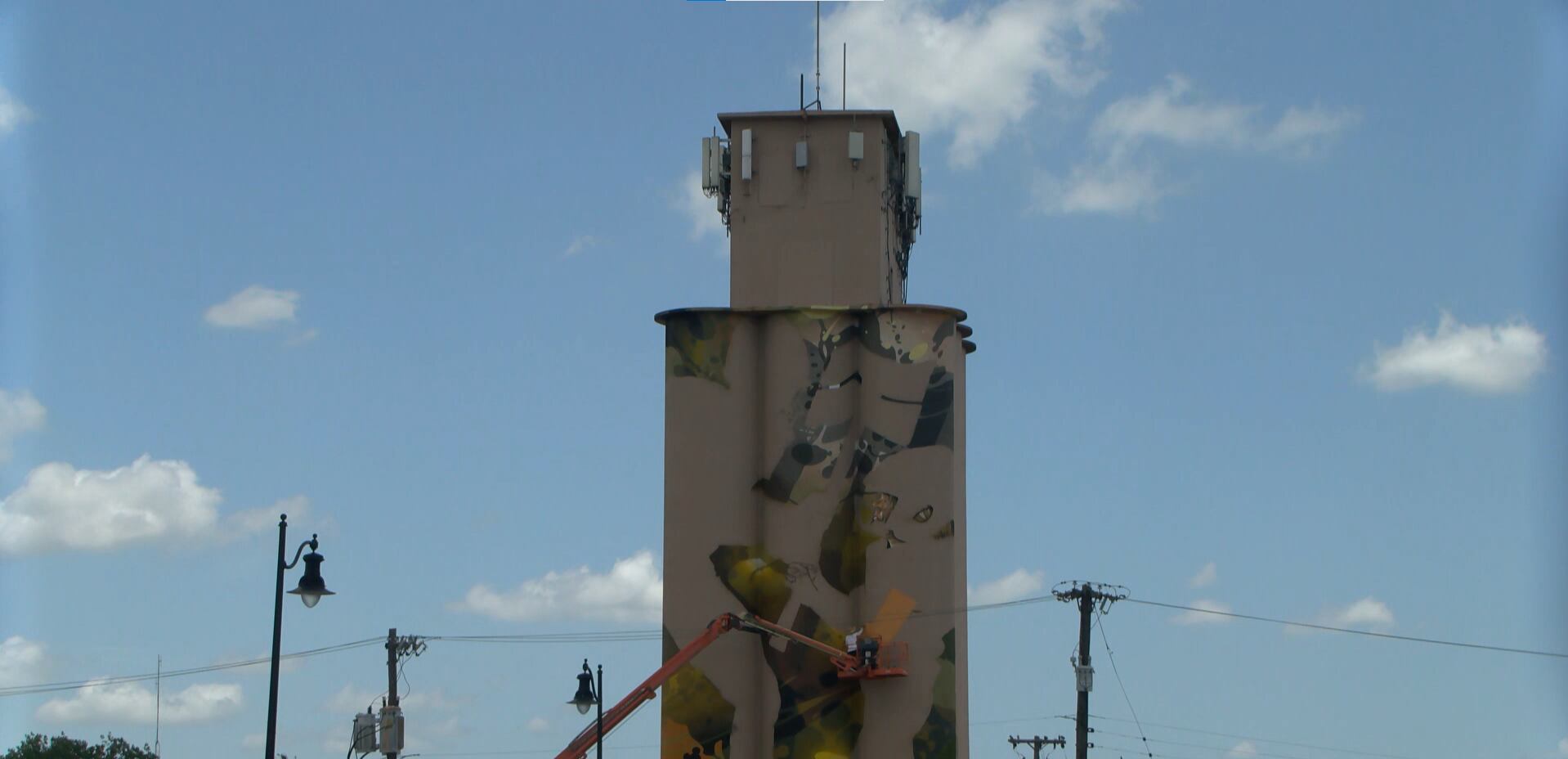 Battle of the Ax mural in progress in Denison