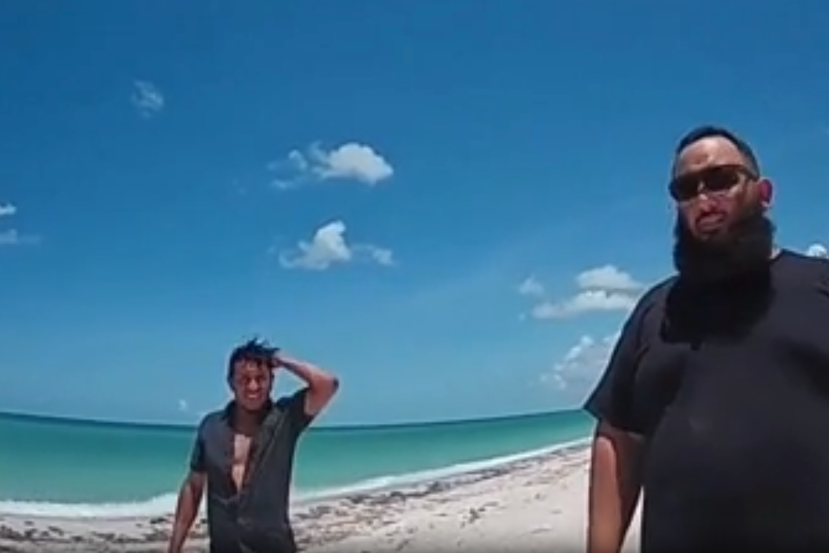 Good samaritan who helped 9-year-old after shark attack now detained by ...