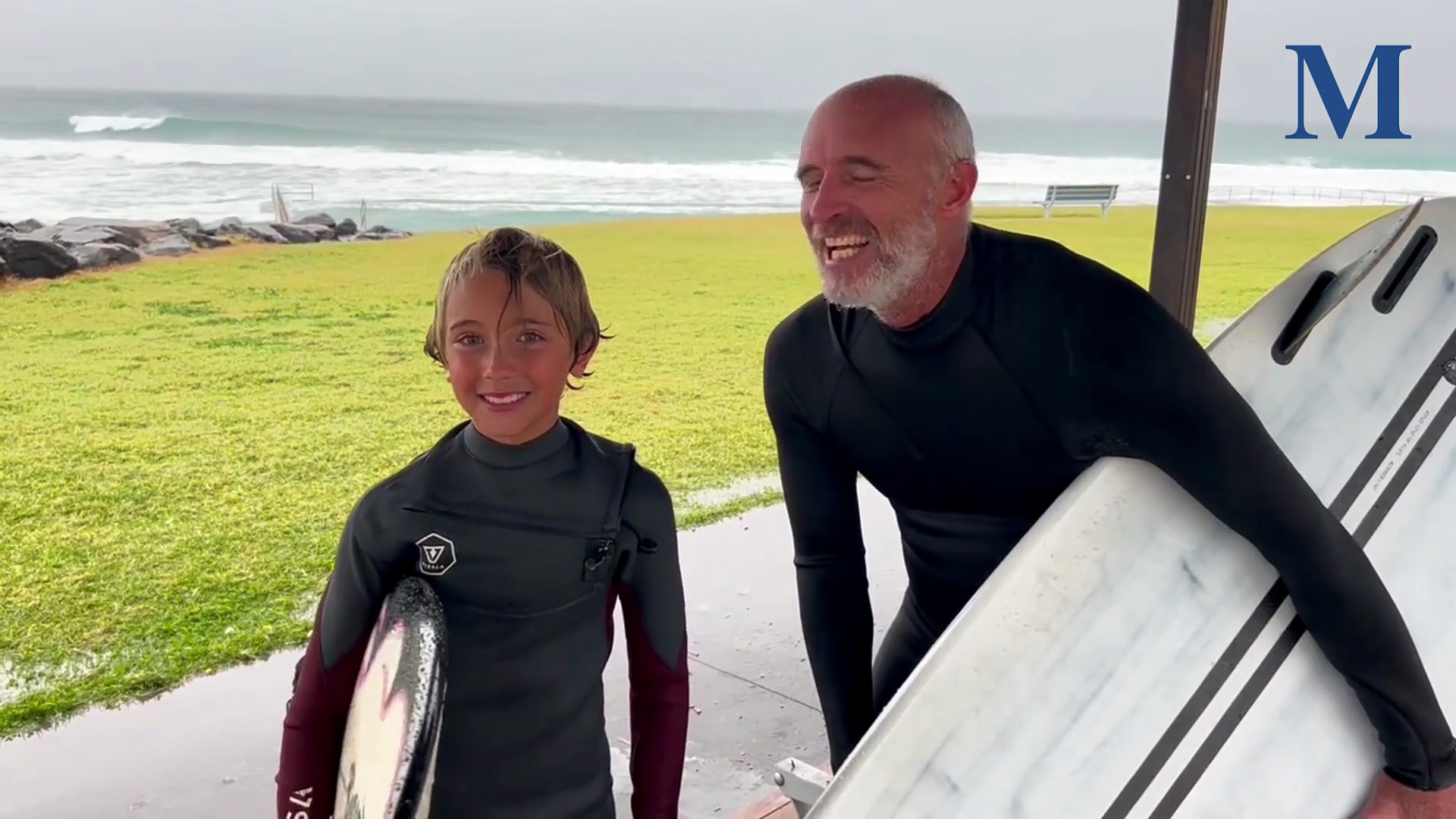 Surfers hit the waves ahead of severe weather
