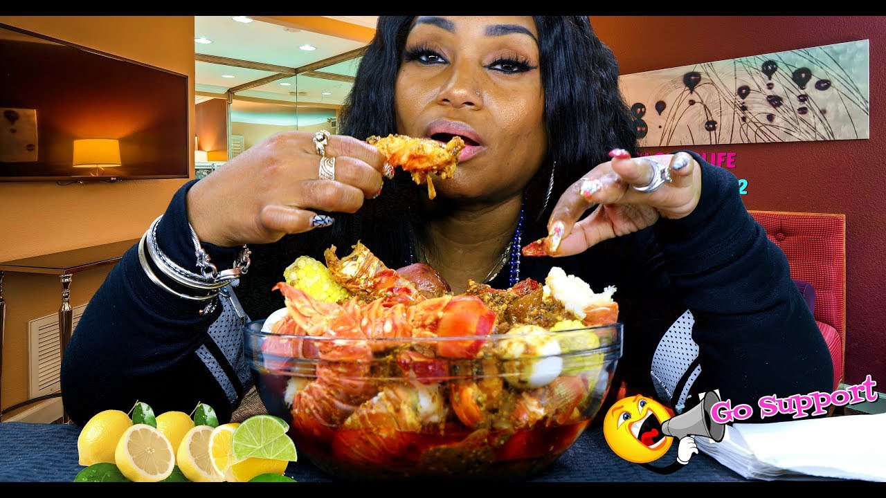 Lobster tail mukbang in butter sauce at 4:57 mark