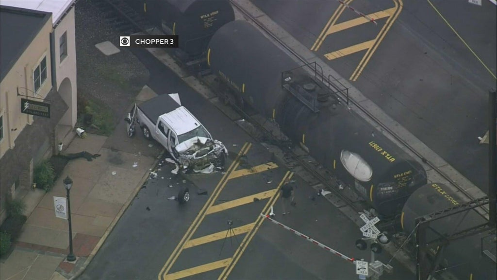 2 injured after truck crashes into moving train in Lansdale, Pennsylvania
