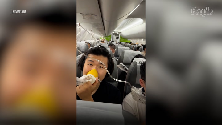 Plane Passengers Write Farewell Notes After Oxygen Masks Drop and ...