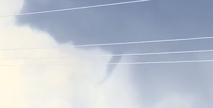 Funnel Cloud Swirls Over Albuquerque Mountains