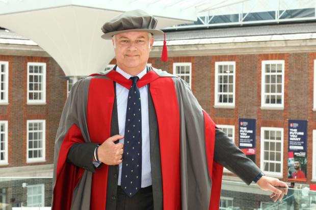 Former Royal Navy pilot receives honorary degree for mental health advocacy