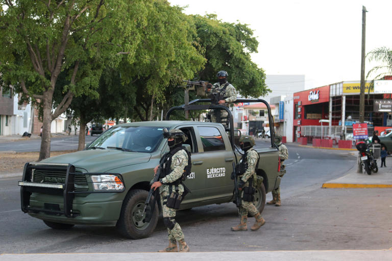 20 bodies, some decapitated, found in Mexico amid bloody cartel turf war