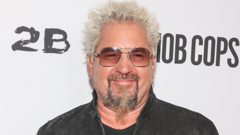 Why Guy Fieri Is Being Sued By A Winner Of His Own Food Network Show