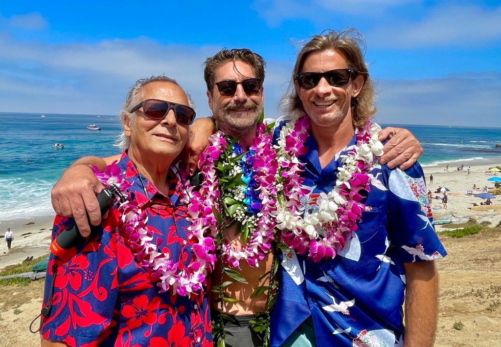 Surfers pay tribute to Mike Hynson with paddle out in La Jolla