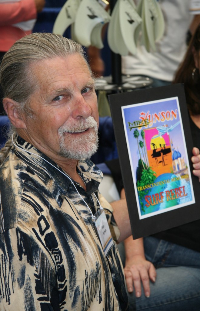 Surfers pay tribute to Mike Hynson with paddle out in La Jolla