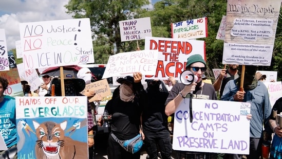 Photos: ‘No Alligator Alcatraz’ protests erupt as Trump visits ...