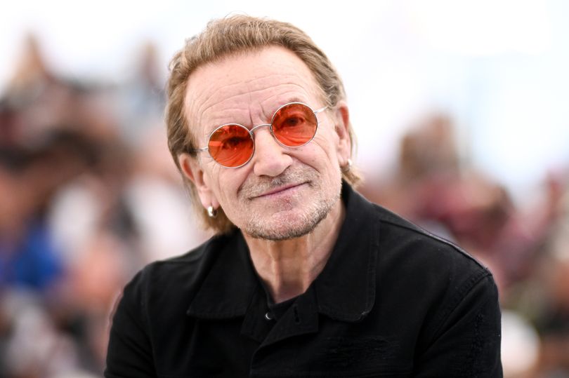 Bono makes surprise appearance during video call with fired USAID employees