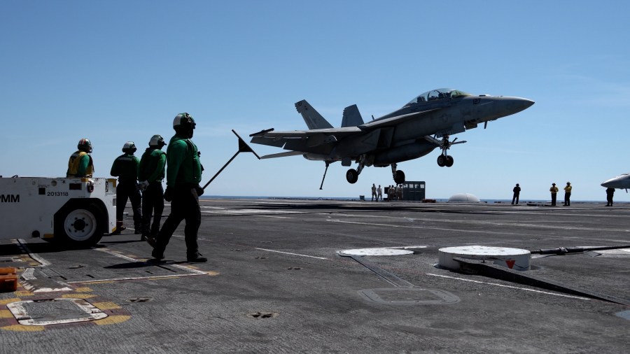 Junior pilots practice flying, taking off USS George H.W. Bush