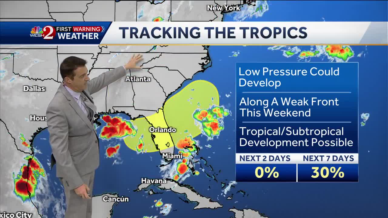 Low pressure may form along stalled front this holiday weekend!