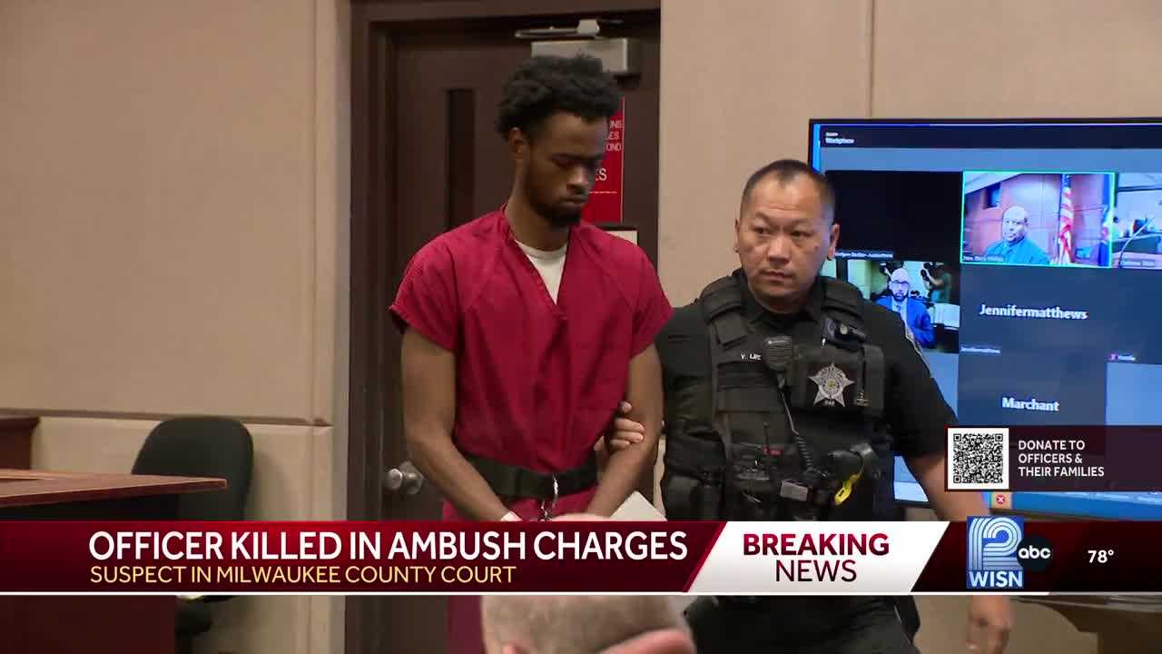 911 caller saw man with gun night Milwaukee officers were shot