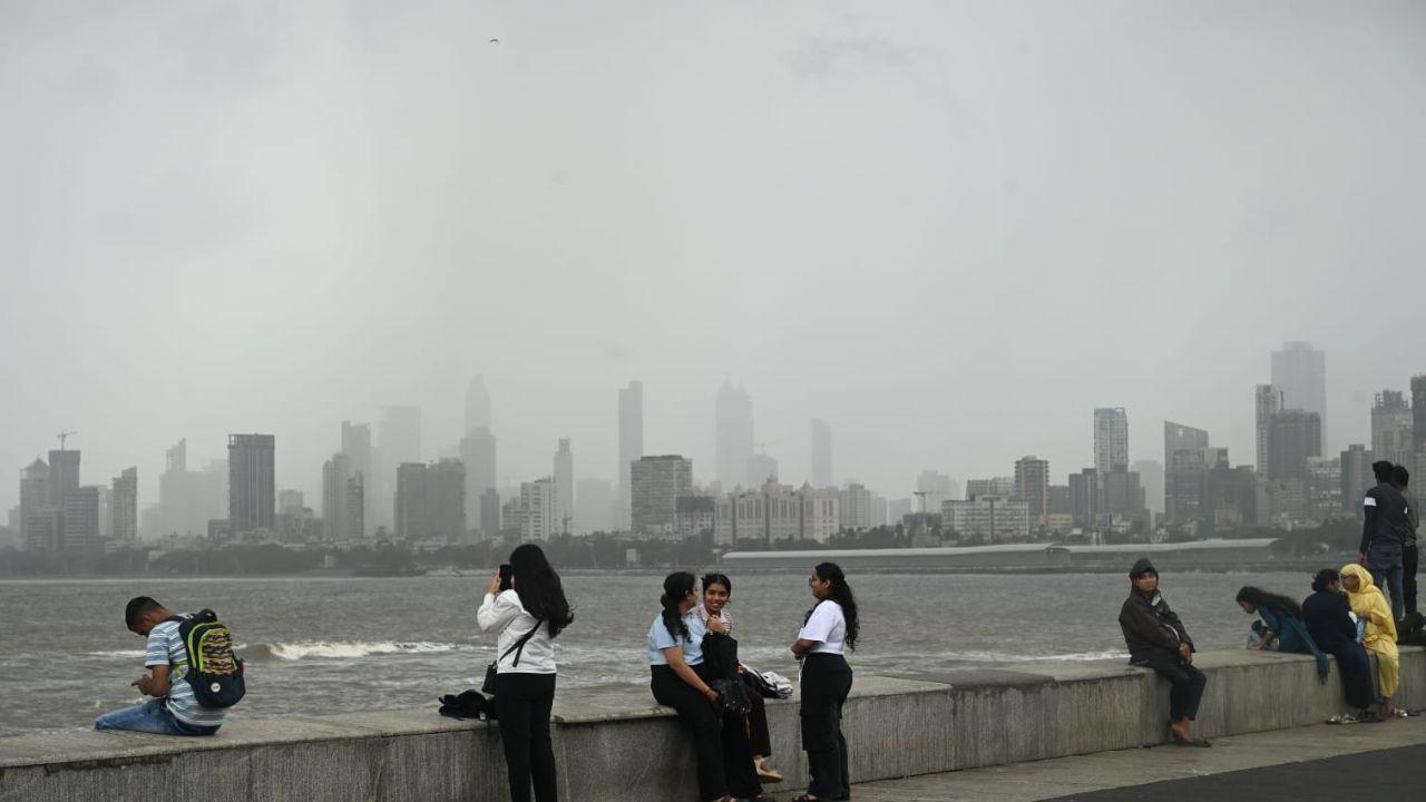IN PHOTOS Dark clouds loom over Marine Drive as rain sweeps Mumbai