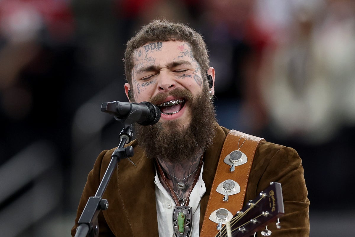Post Malone falls off stage while trying to toast fan