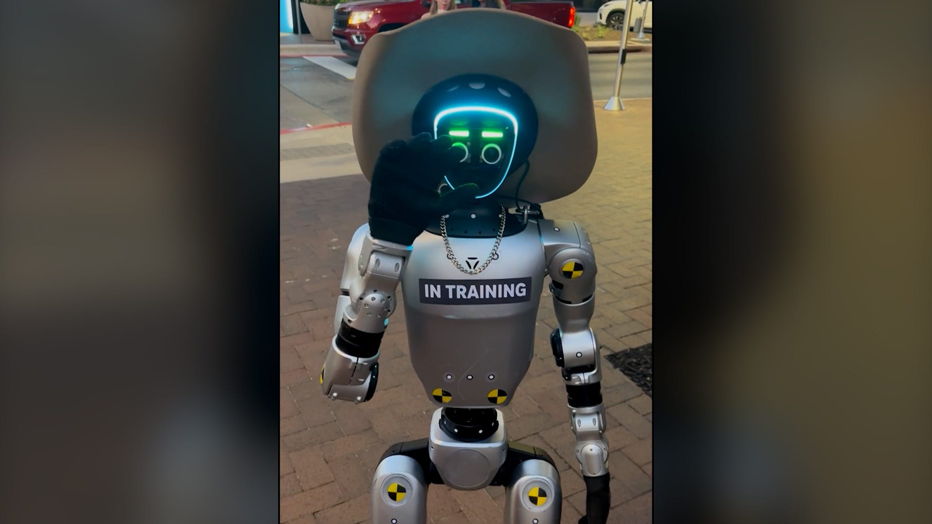 A cowboy hat-wearing robot is running around Austin handing out compliments