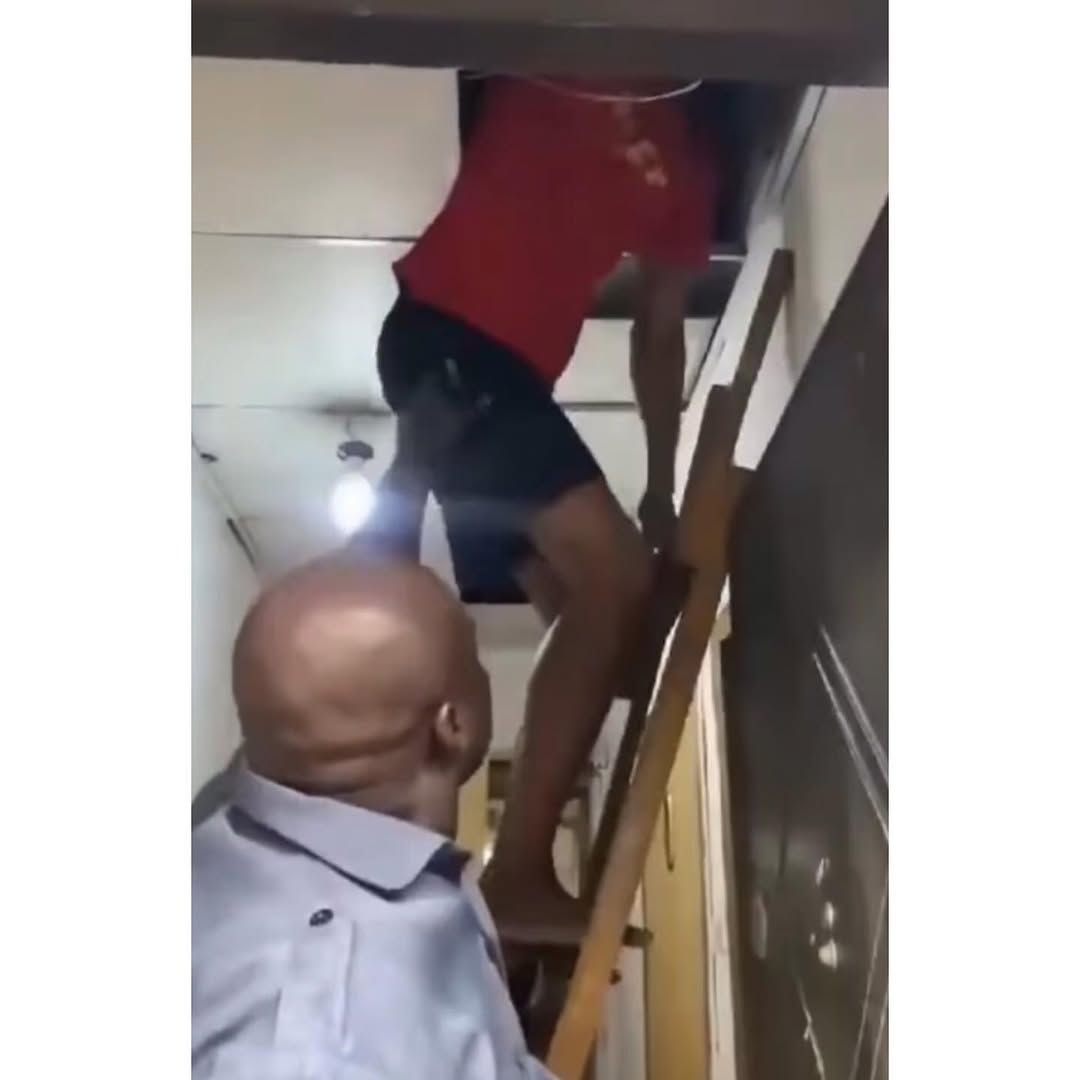 VIDEO: Young man caught hiding in bank ceiling after failed overnight heist