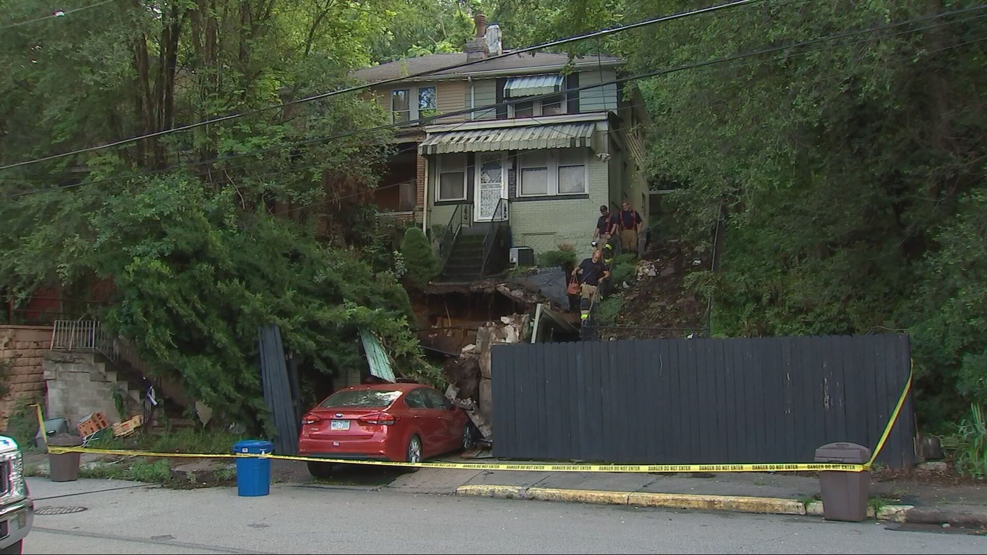 Garage collapses into house in Homewood