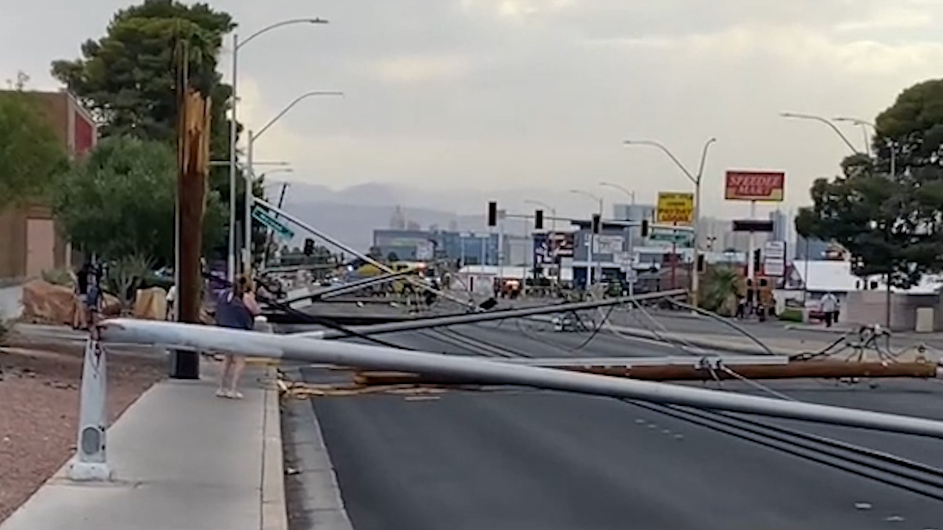 Powerful windstorm topples dozens of power poles across Las Vegas