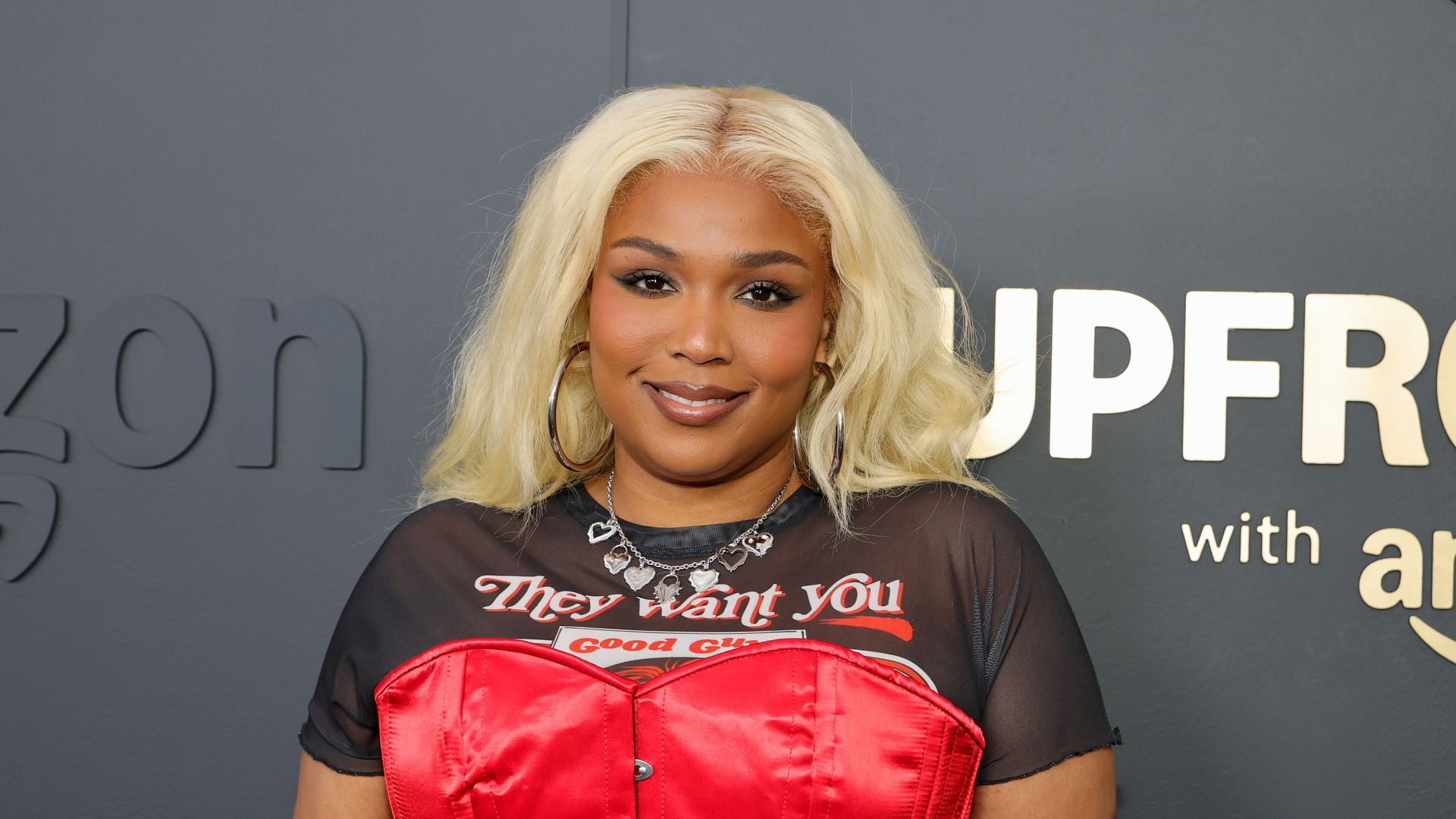 Lizzo shows off weight loss in white bikini after clapping back at body ...