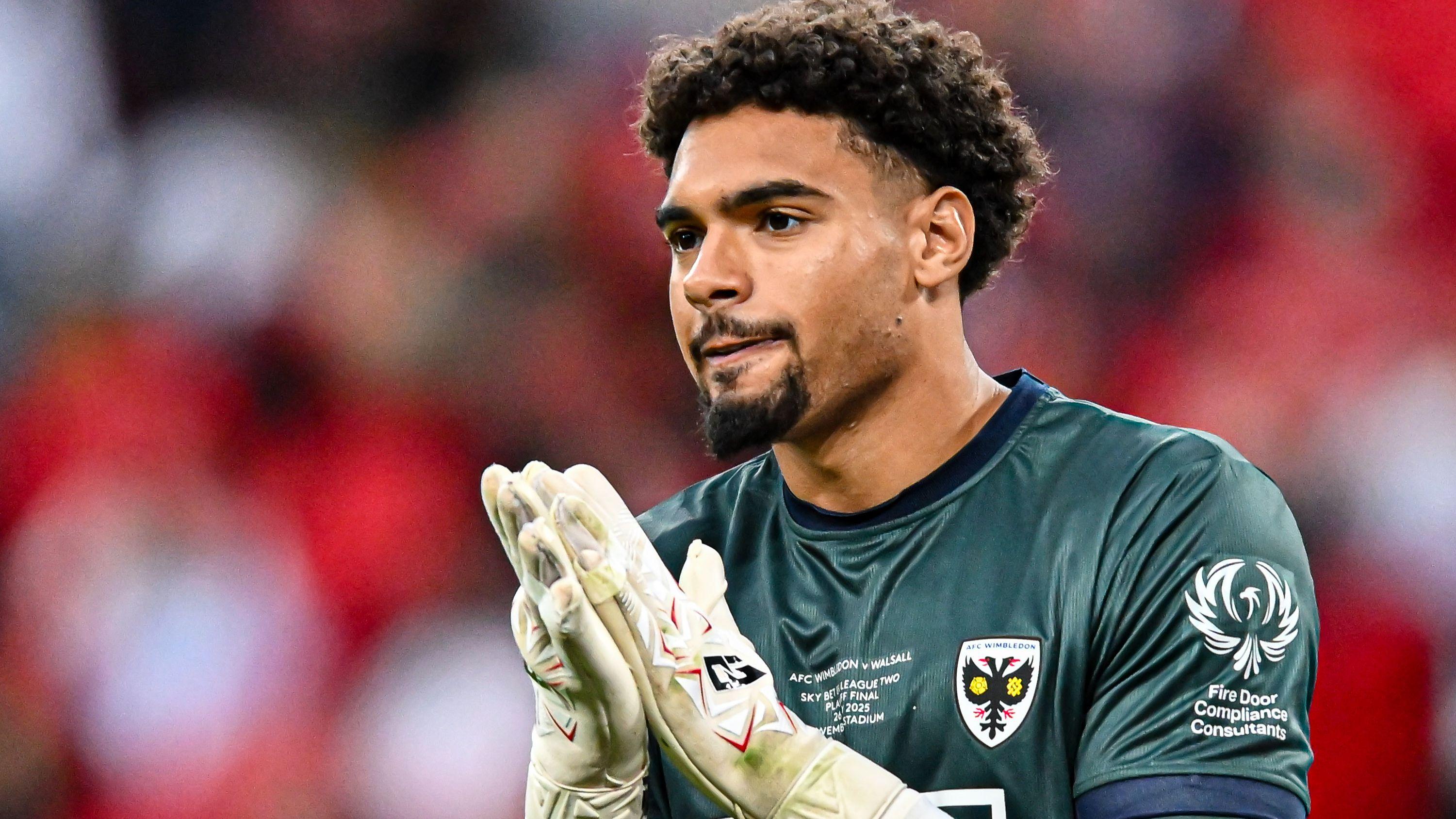 Huddersfield sign Palace keeper Goodman