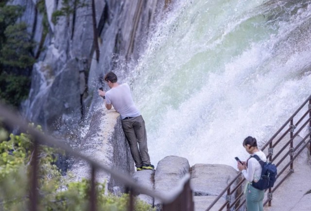 Scary photo captures tourist's close call with roaring waterfall: 'This ...