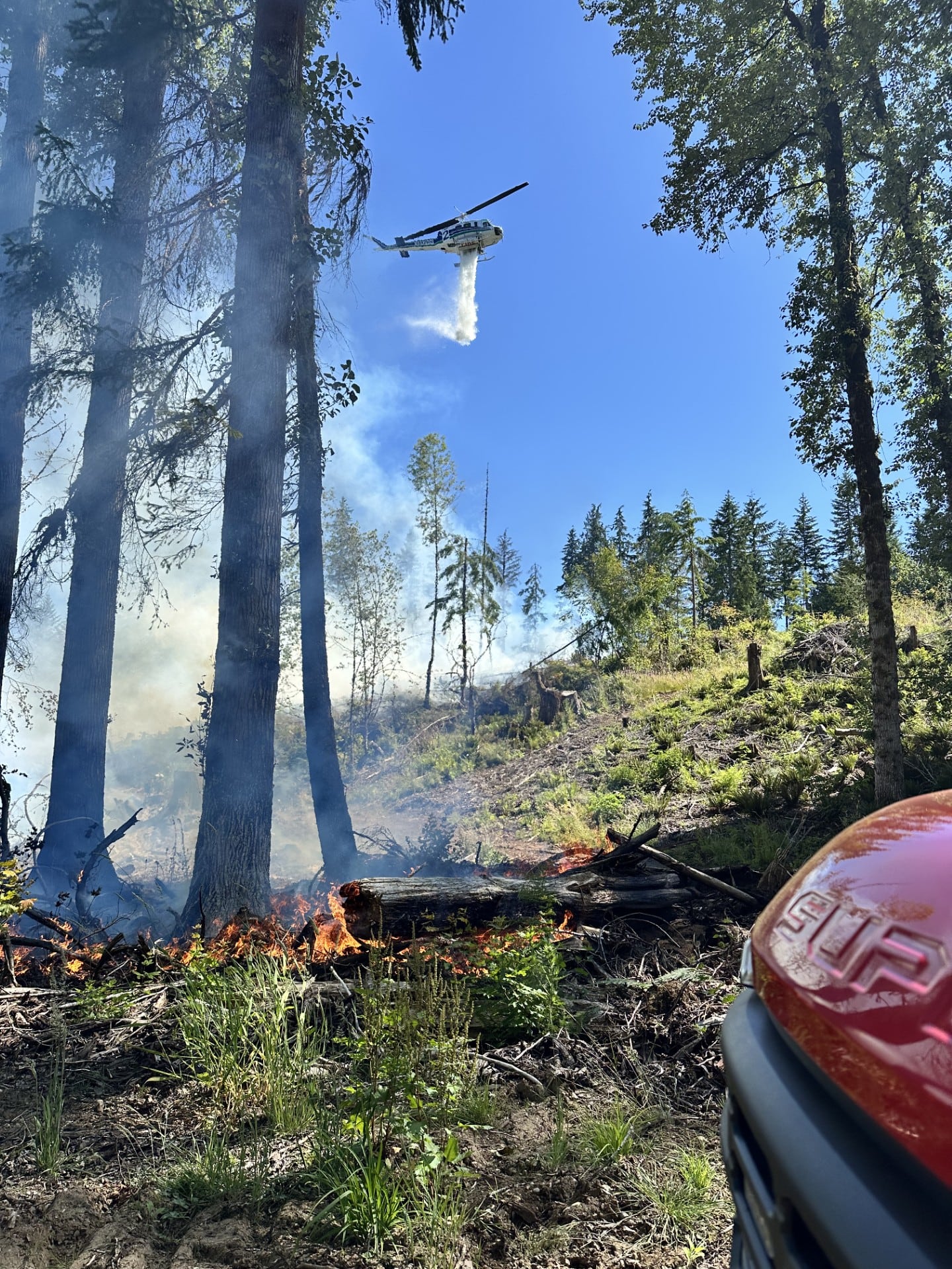 Multiple fire departments keep rapidly growing fire in Granite Falls from reaching nearby homes