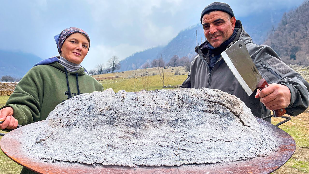 Whole fish buried in salt and cooked