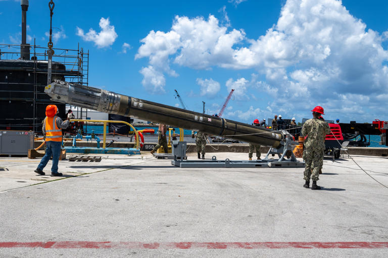 Photos show US submarine loading cruise missiles at frontline Pacific base
