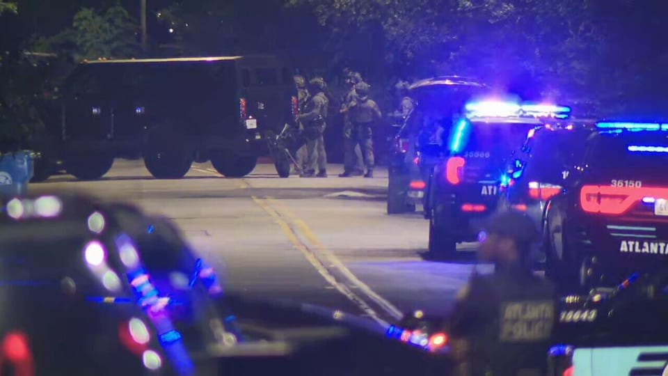 Large police presence, SWAT team outside home in SW Atlanta