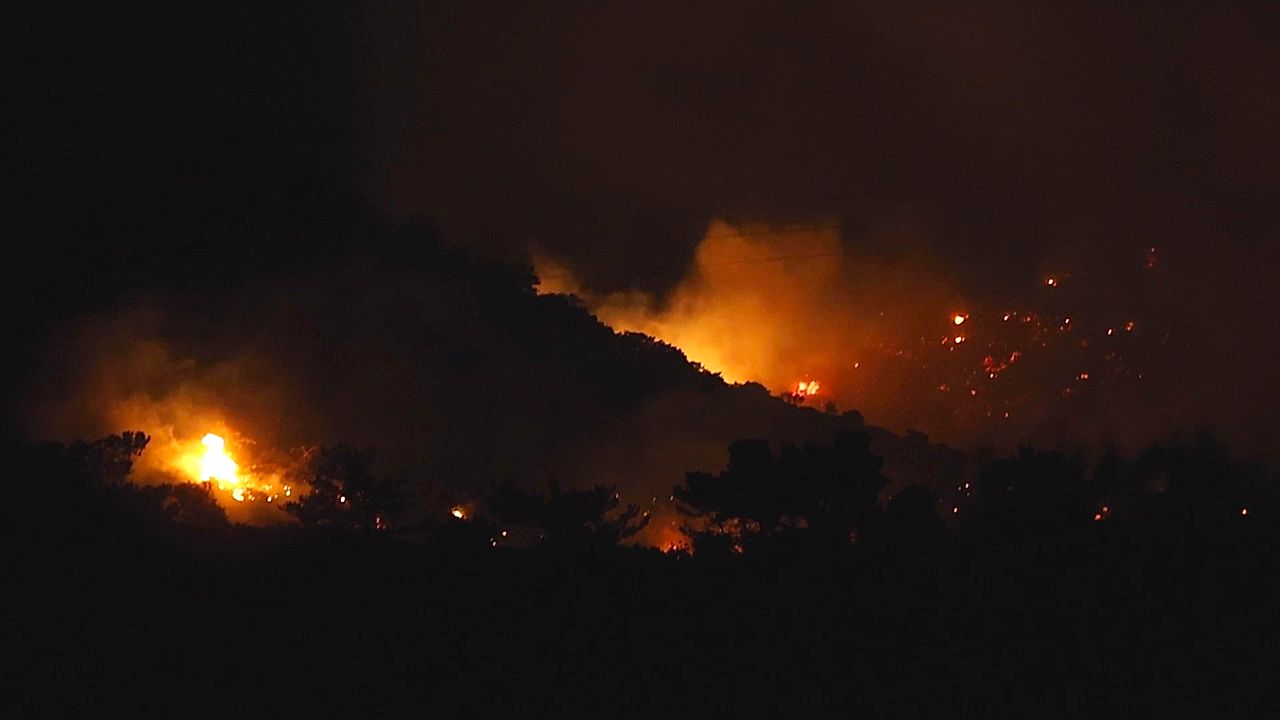 Apocalyptic scenes as wildfires break out across Greece amid heatwave