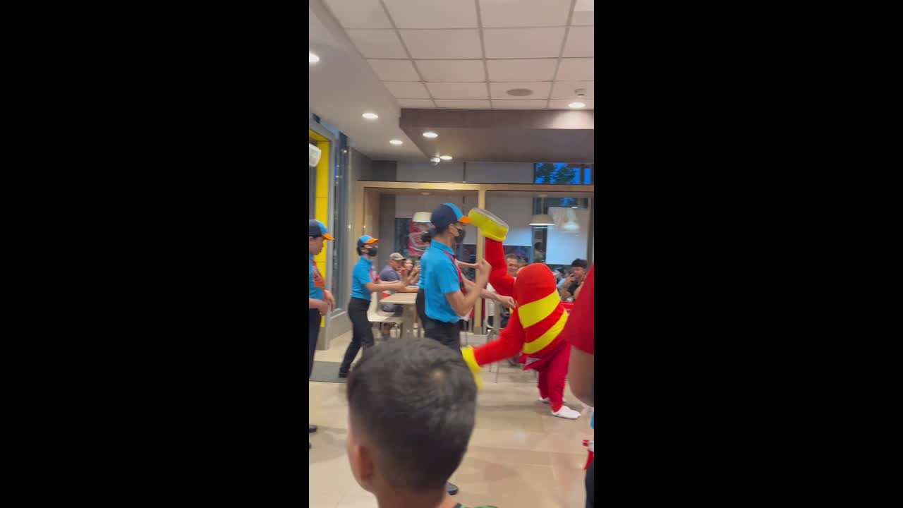 Jollibee loses his head while dancing for fast food chain visitors