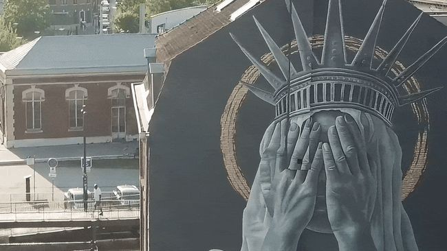 New Mural in France Depicts Statue of Liberty Covering Her Face in Shame
