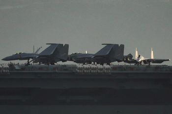 Chinese aircraft carrier sails into Hong Kong to boost patriotism