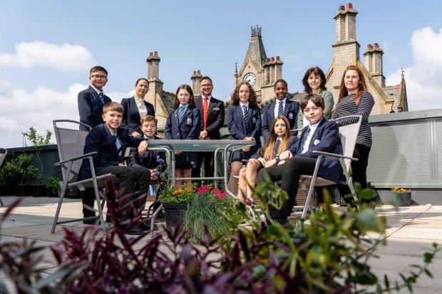 School rooftop terrace transformed into relaxing garden space