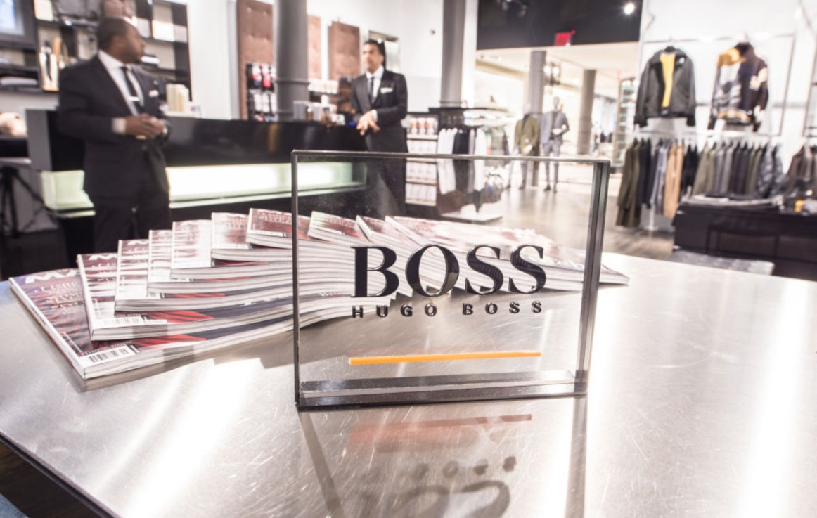Mike Ashley tightens grip on Hugo Boss amid dividend demand