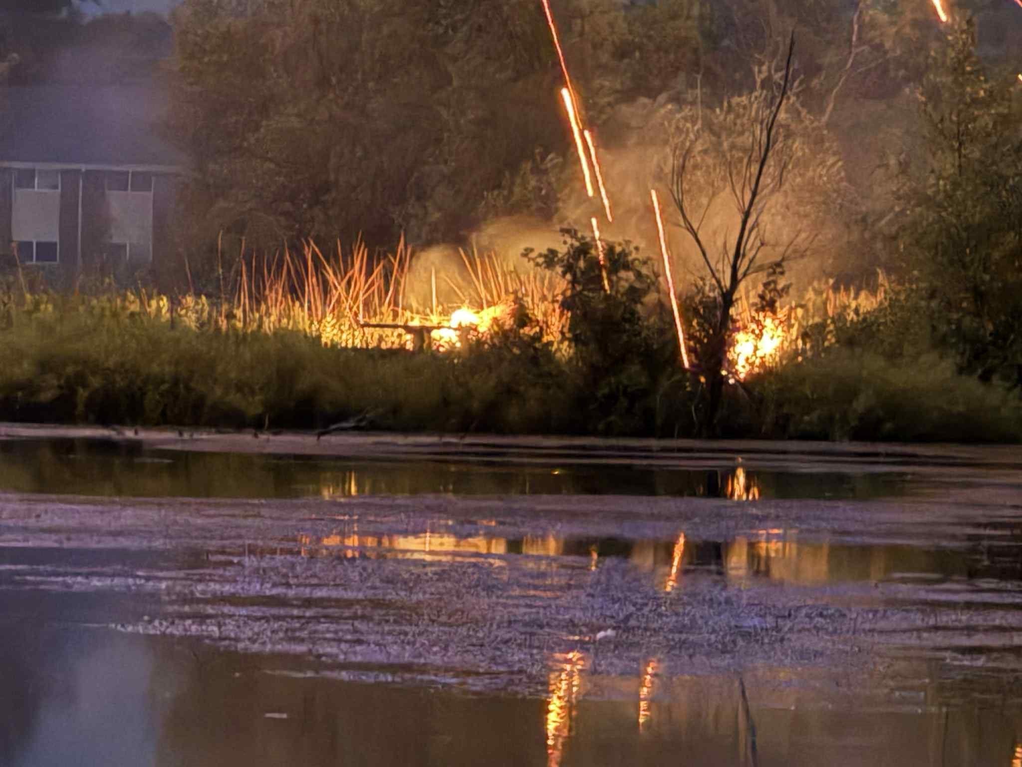 Appleton Memorial Park fireworks lead to fire along pond