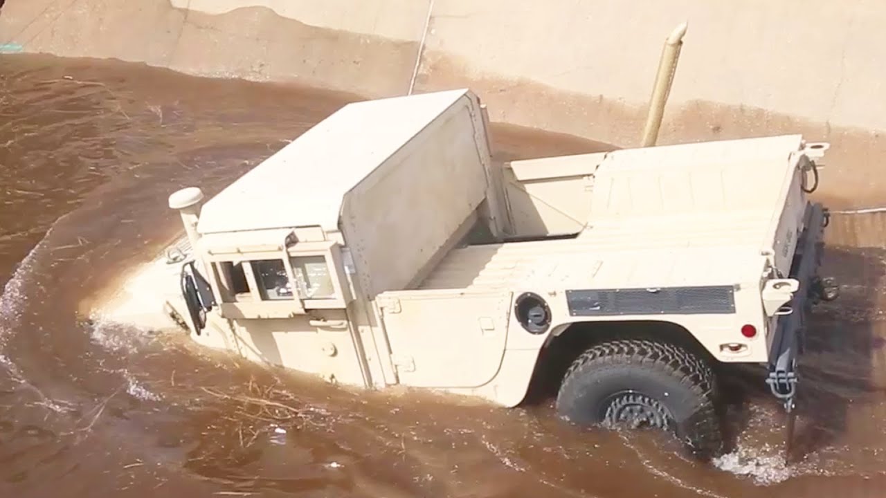 US Marines test a $200K Humvee's ability to stay afloat in water