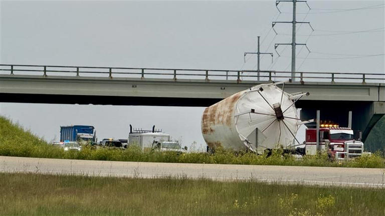 Truck hauling grain silo hits bridge east of Edmonton, causes ...