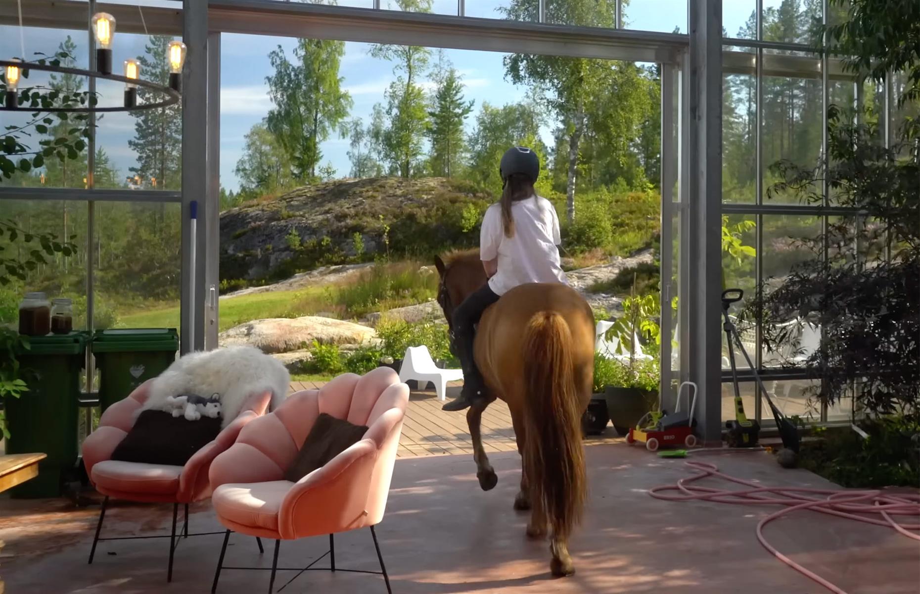 An architect created her dream home inside a giant glass greenhouse