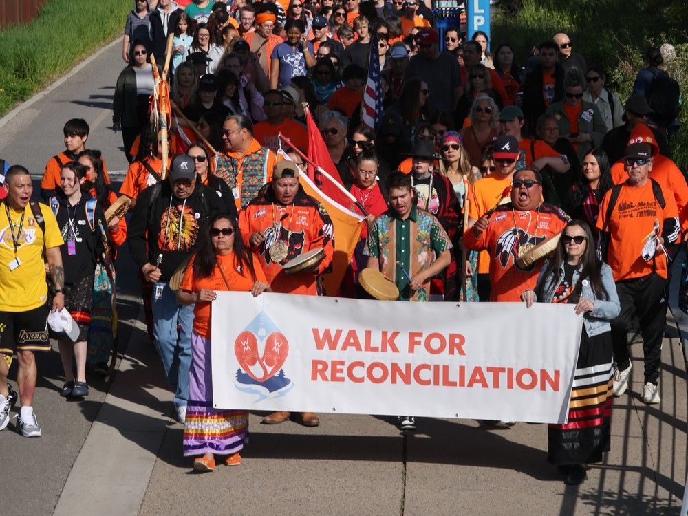 Walk for Reconciliation draws hundreds of Calgarians despite stormy weather