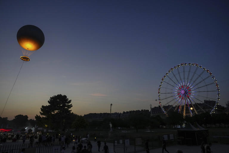 Paris' iconic cauldron from the Olympic Games returns to light up ...