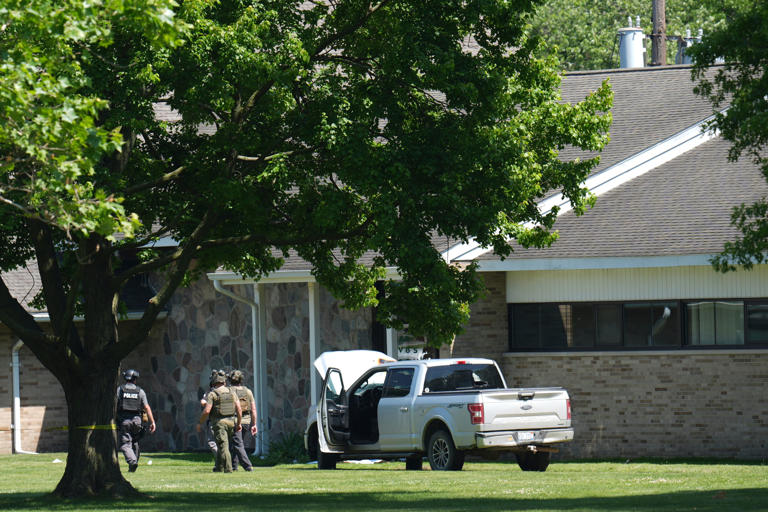 Michigan church shooting: Minister ran over gunman before security ...