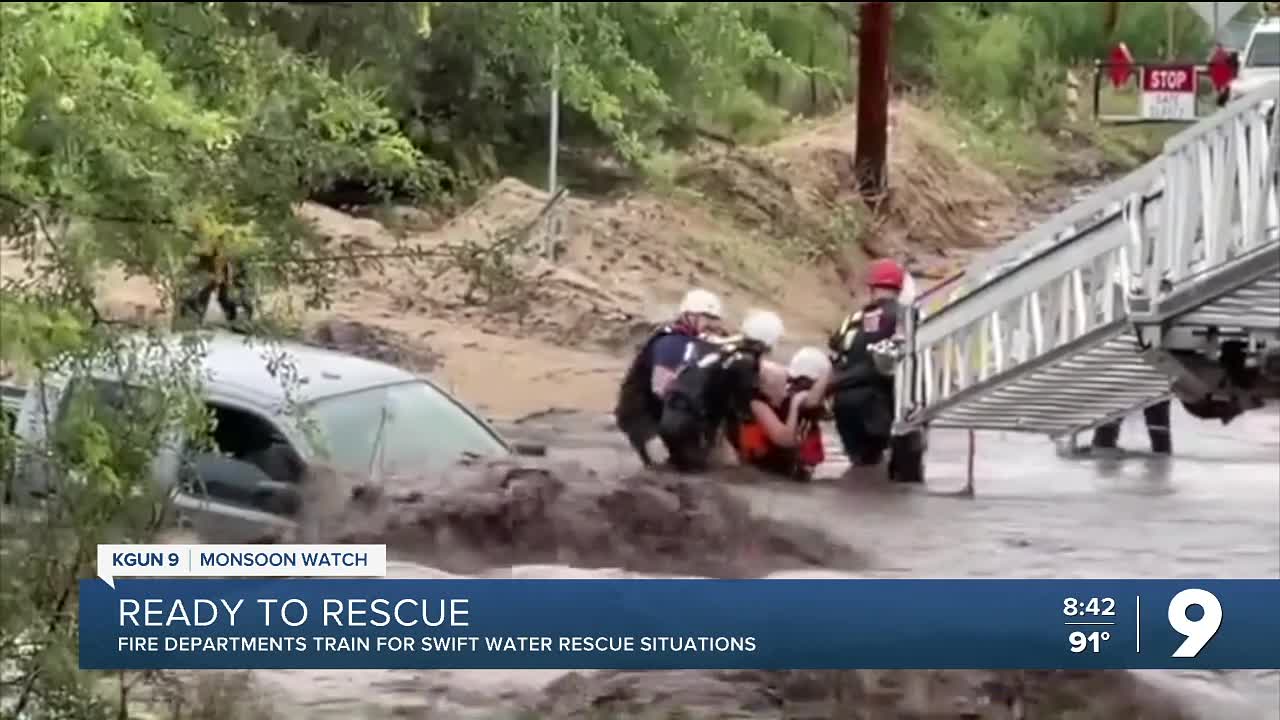 Firefighters train for swift water rescue situations during monsoon