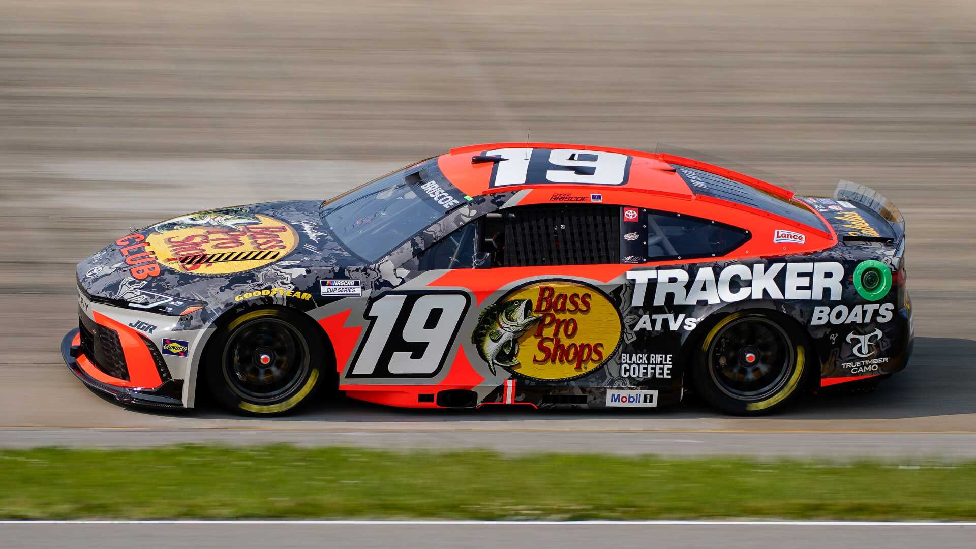 Chase Briscoe holds off Denny Hamlin to win at Pocono Raceway on fuel ...