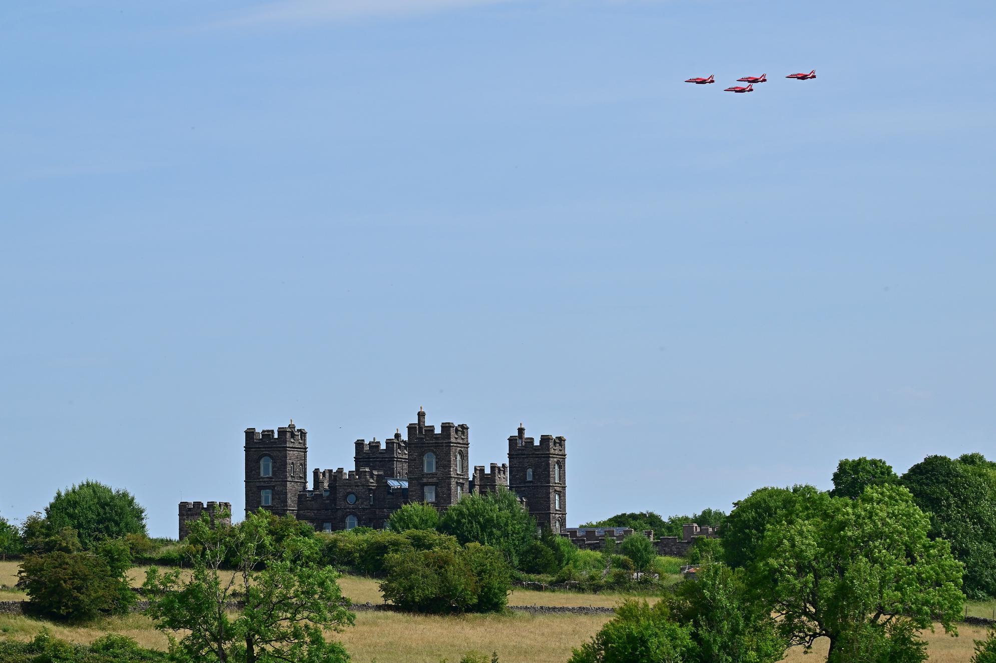 Iconic Red Arrows aircraft captured in the skies over Derbyshire
