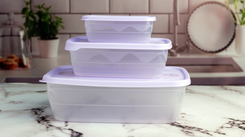 The Genius Hack For Keeping Those Chaotic Plastic Food Container Lids ...