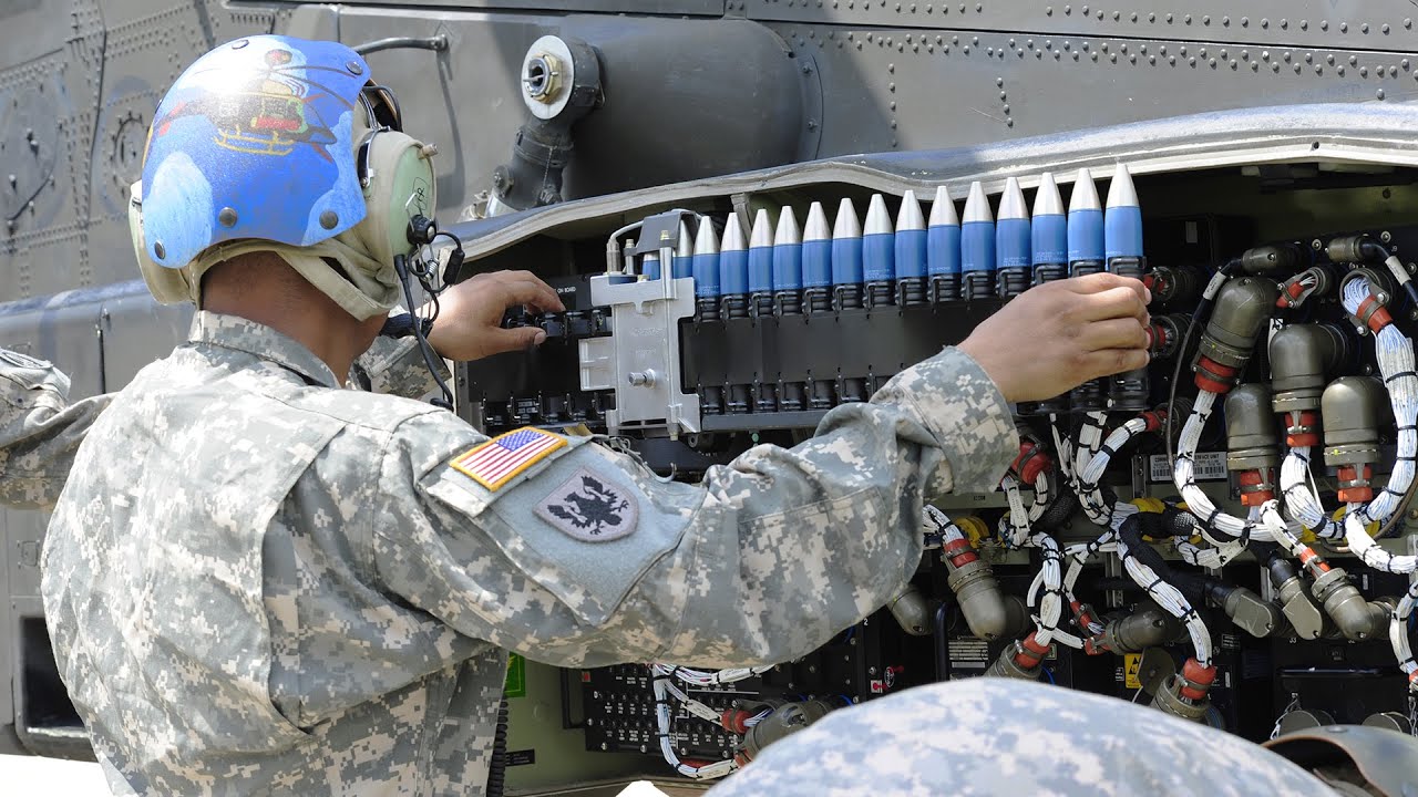 Loading Special Ammunition into the US AH-64 Apache Helicopter
